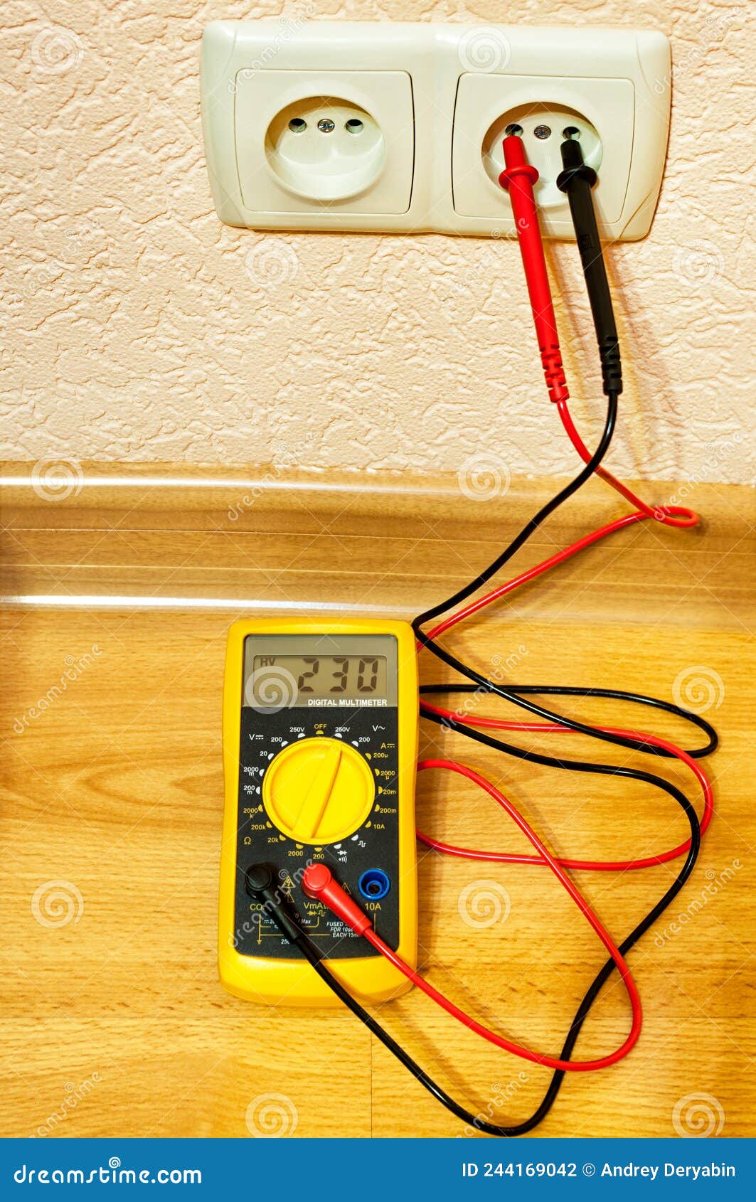Metering Socket Voltage with Modern Digital Multimeter Stock Photo ...