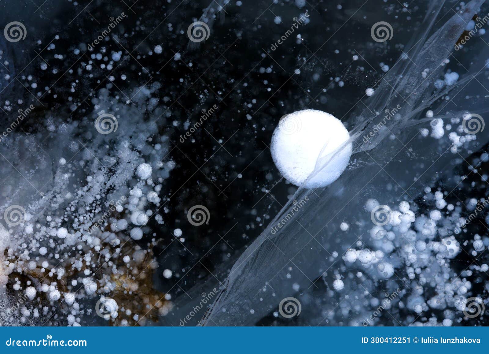 Methane Bubbles, Cracks and Snow on Surface of Baikal Lake Create ...