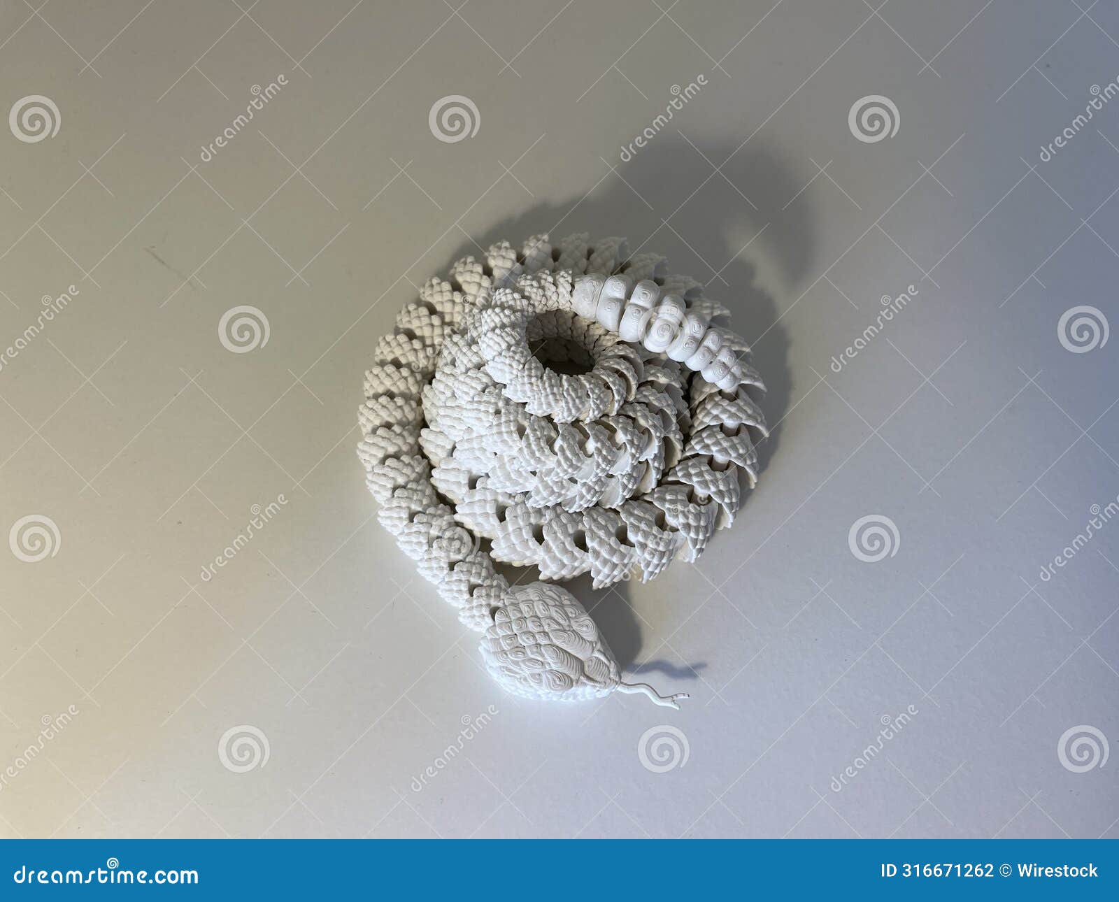 Meticulously 3D-printed Snake Sculpture, Coiled in a Precise, Spiral ...