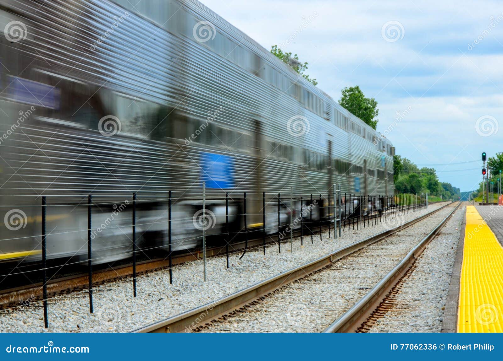 A Metra Passenger Commuter Train Blurs Past Editorial Photo - Image of ...