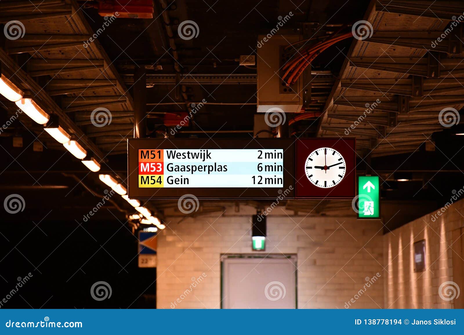 Metro Sign Displaying Arrival Time Stock Photo - Image of city, urban ...