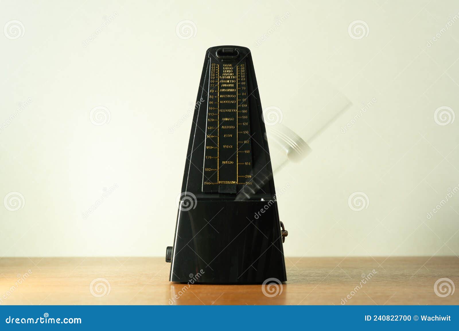 Metronome with Swinging Pendulum Shot with Motion Blur Effect Stock ...