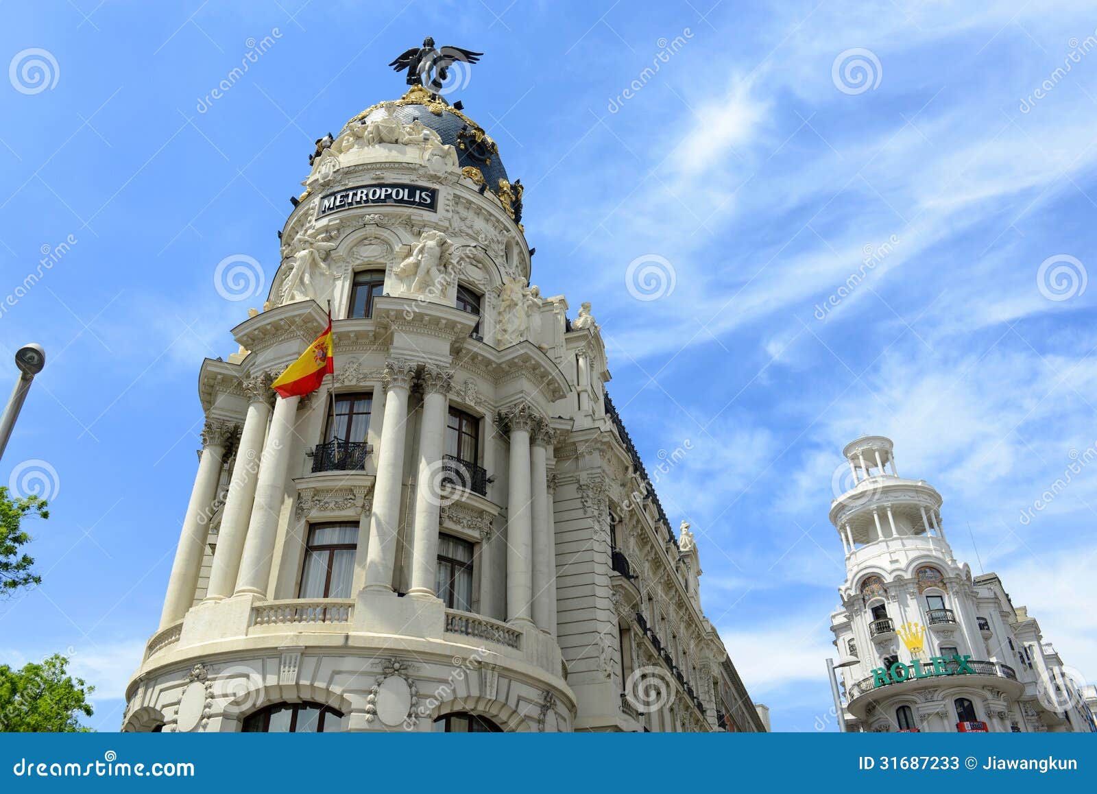 Metropolis and Grassy Building, Madrid, Spain Editorial Stock Photo ...
