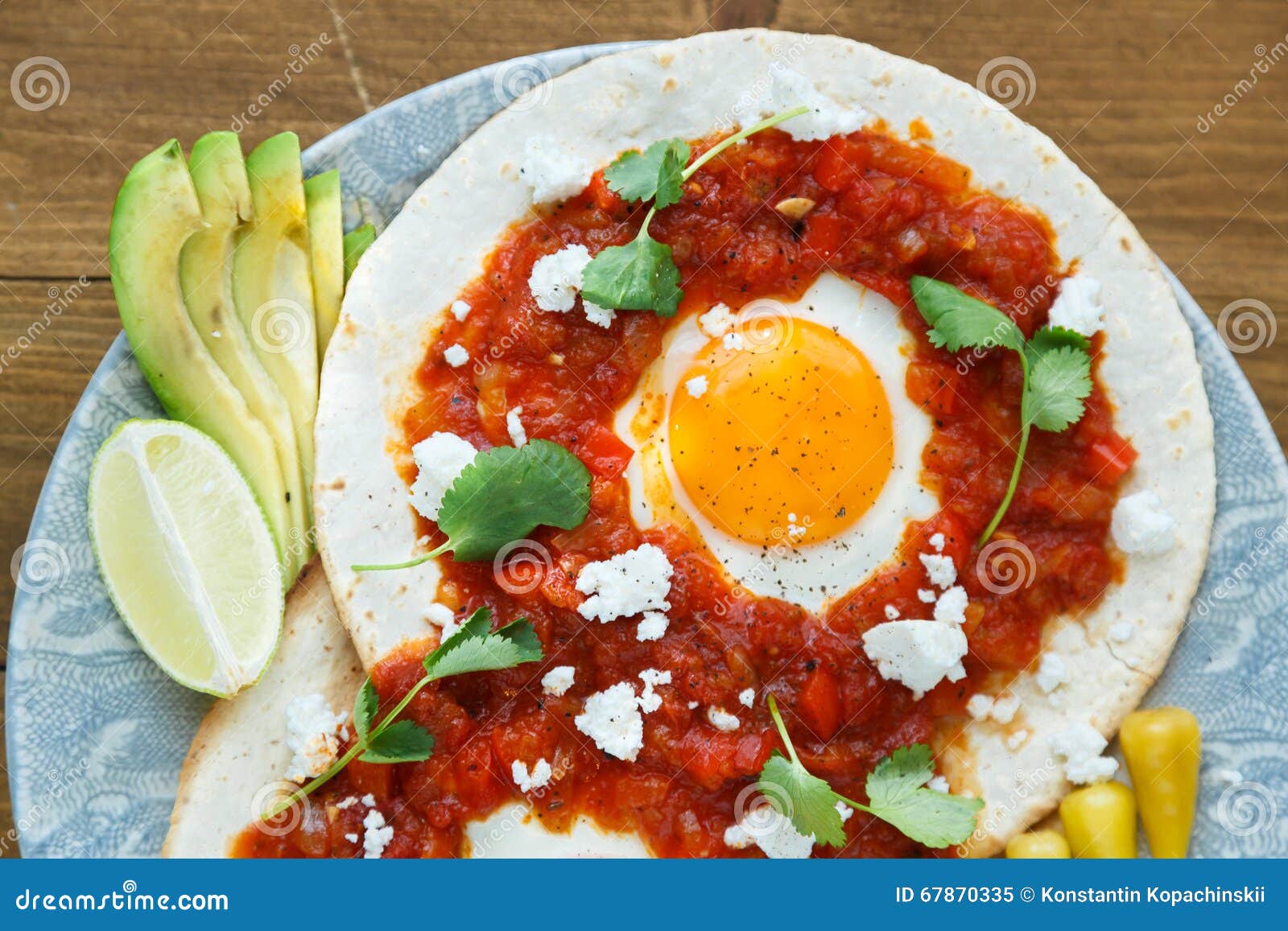 Mexican Breakfast Huevos Rancheros: Fried Egg with Salsa Closeup in the ...
