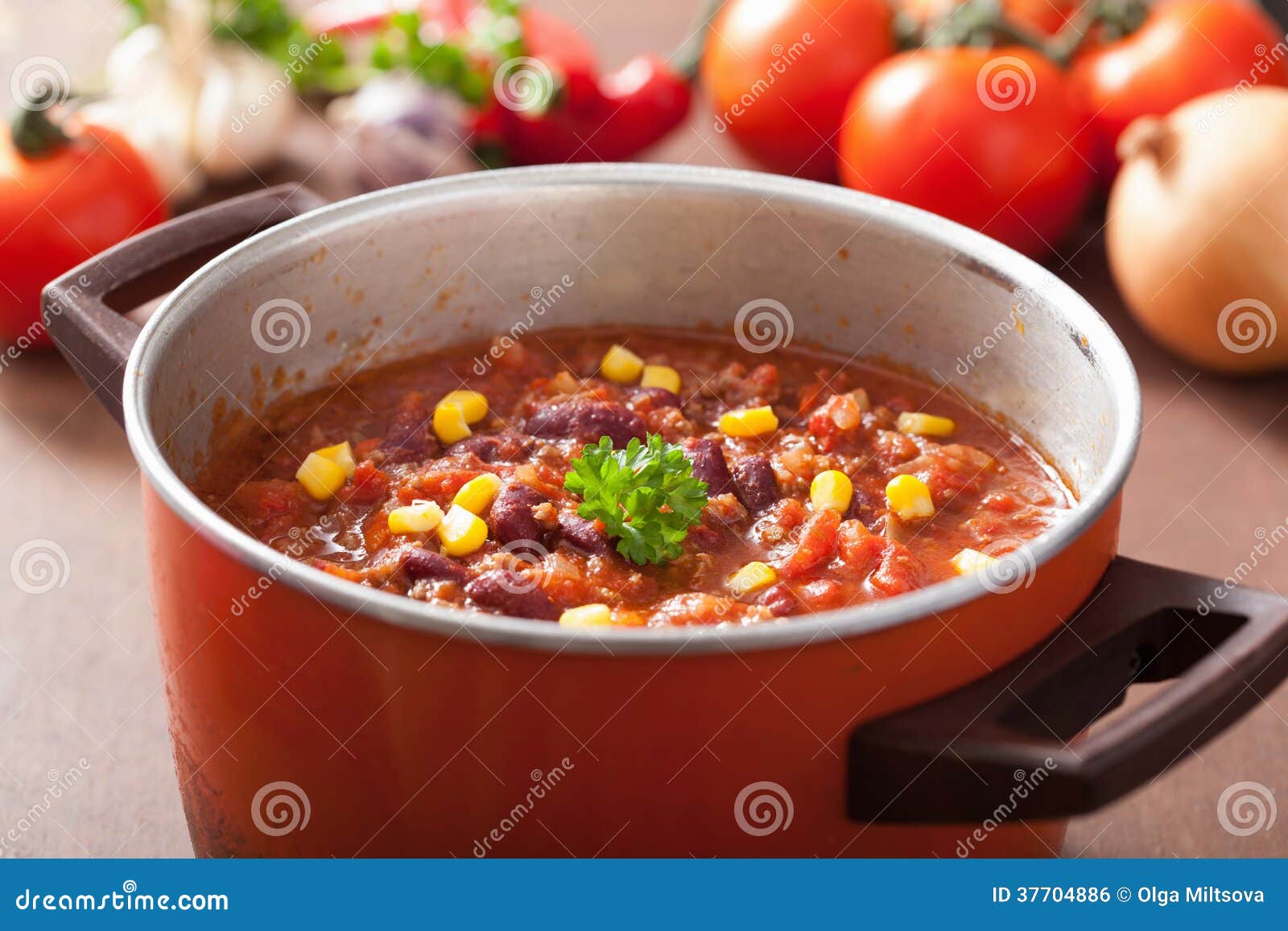 Mexican Chili Con Carne in Red Rustic Pot with Ingredients Stock Photo ...