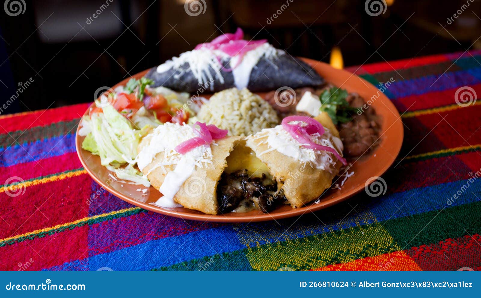 Mexican Combo Plate with Stuffed Corn Empanadas Stock Photo - Image of ...