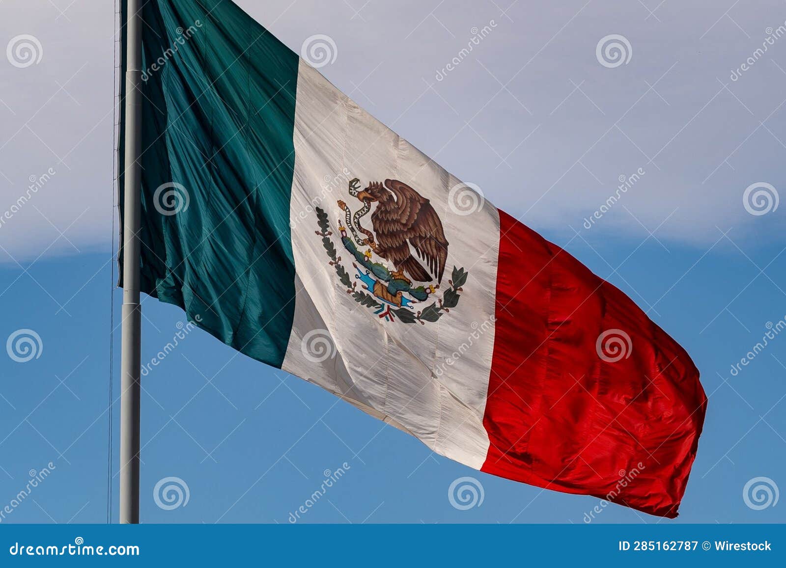 Mexican Flag Waving Against a Blue Sky Stock Image - Image of colors ...