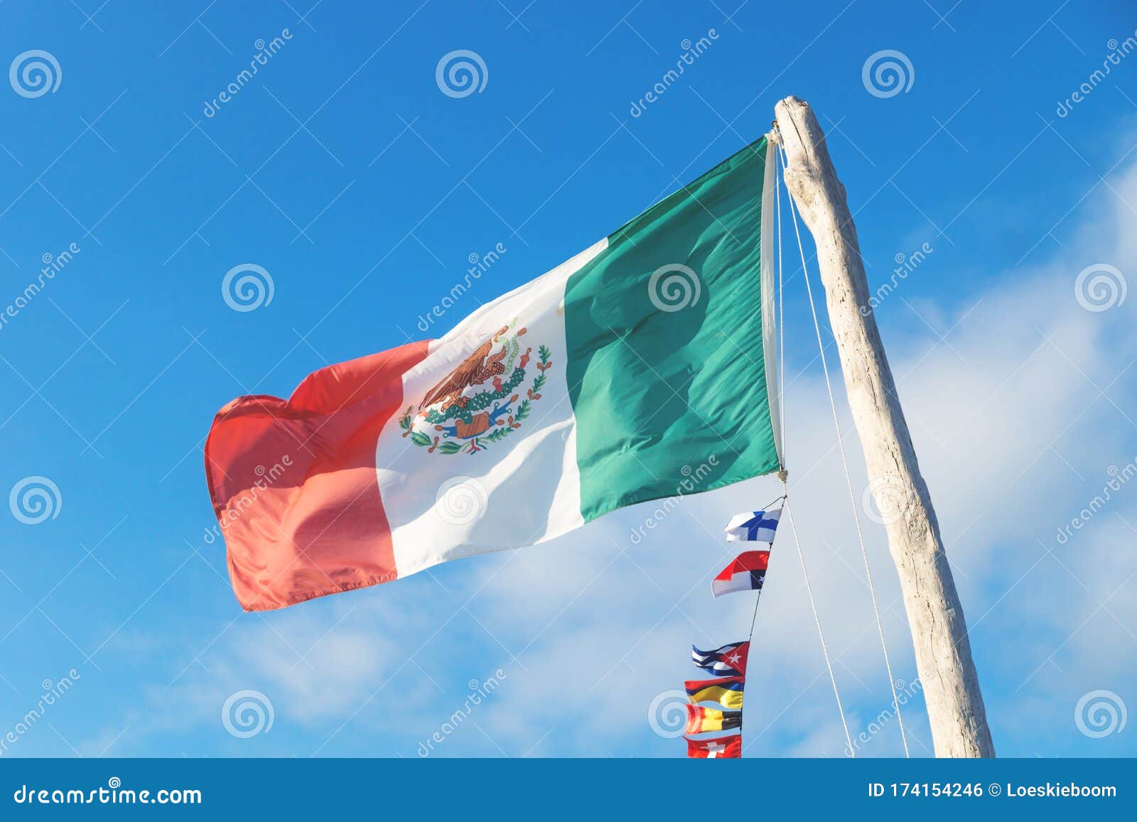 Mexican Flag with Small European Flags on Blue Sunny Sky Stock Photo ...