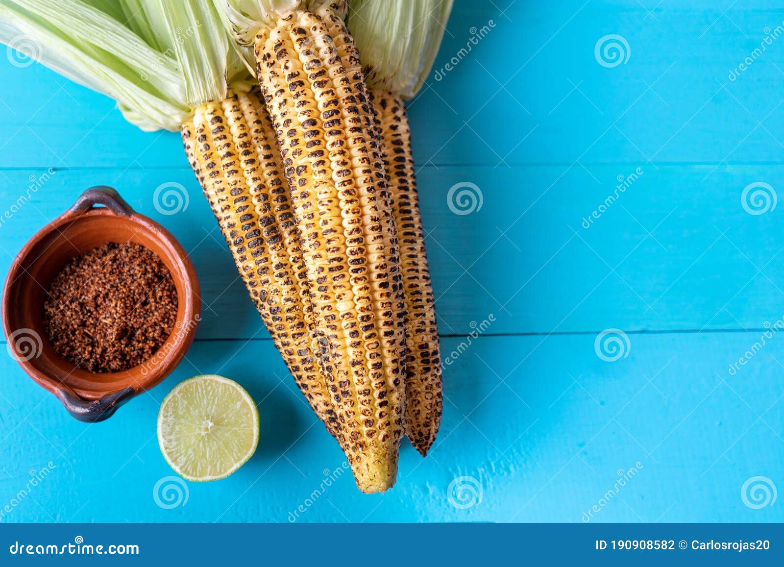Mexican Grilled Corn with Lime and Chili Powder Stock Photo - Image of ...
