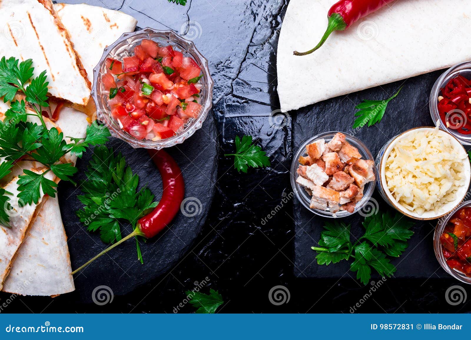 Mexican Quesadilla and Ingredients with Salsa on Black Slate Stone ...