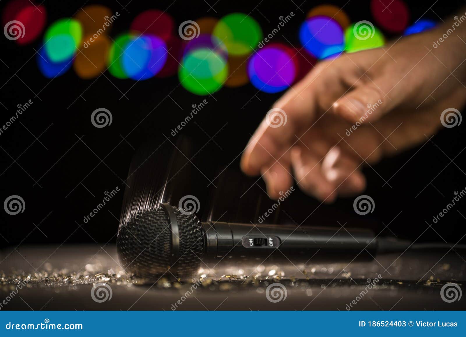 Mic Drop! with Stage Lighting Stock Image - Image of hand, finish ...
