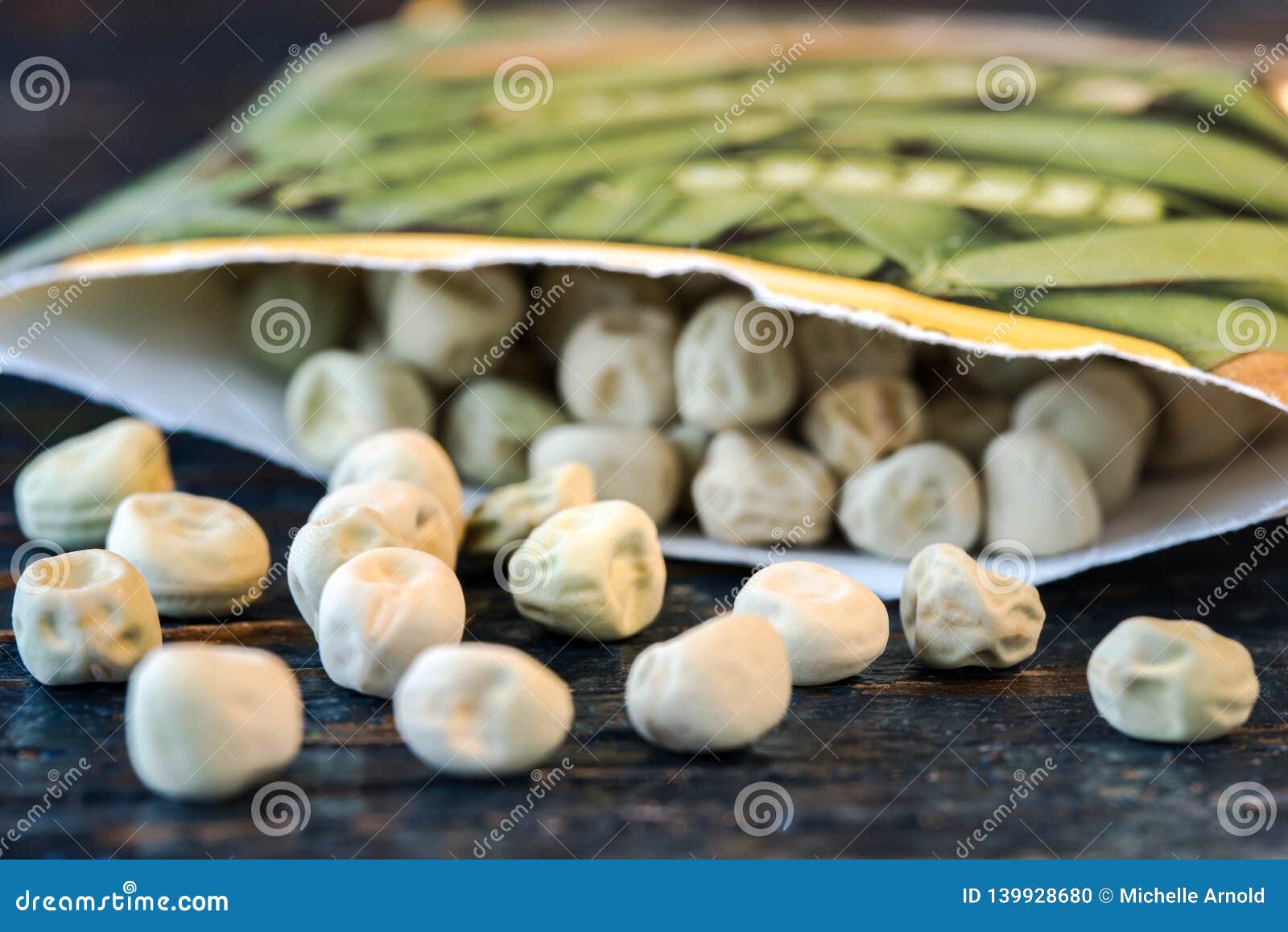 Pea Seeds Spilled from a Seed Packet Stock Photo - Image of organic ...