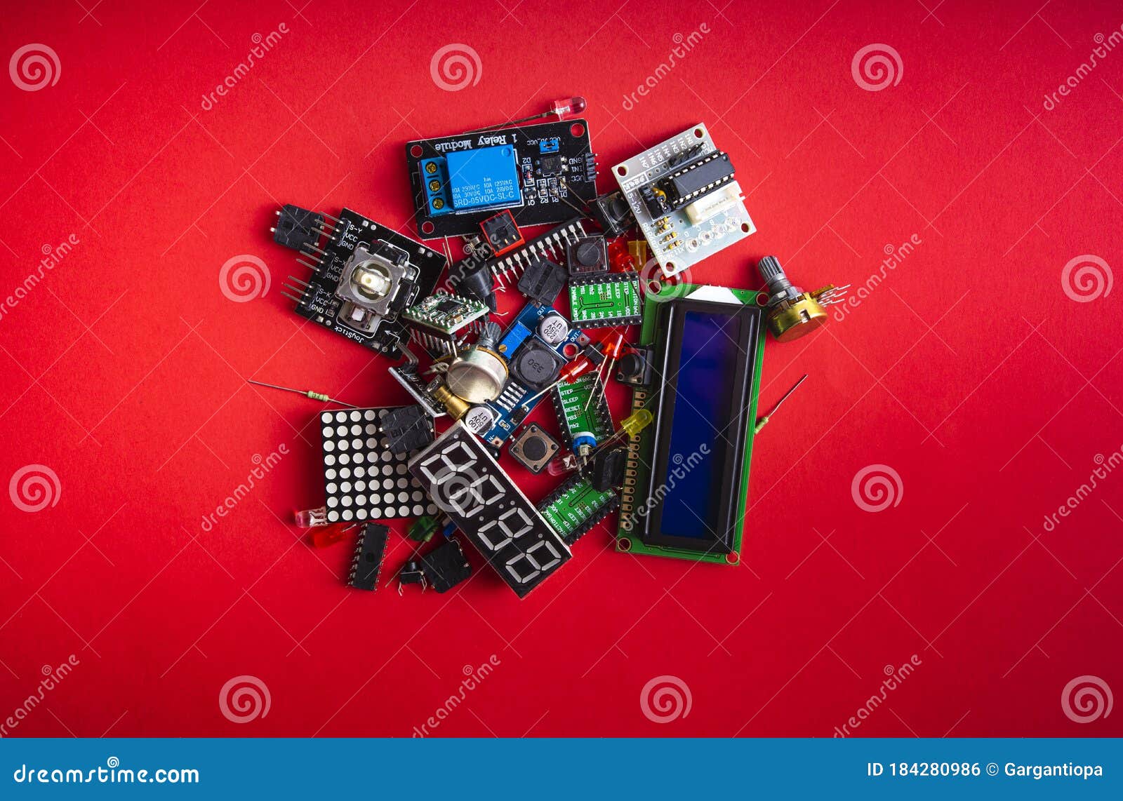 Micro Electronics Arduino Diy Components Over Red Background Top View