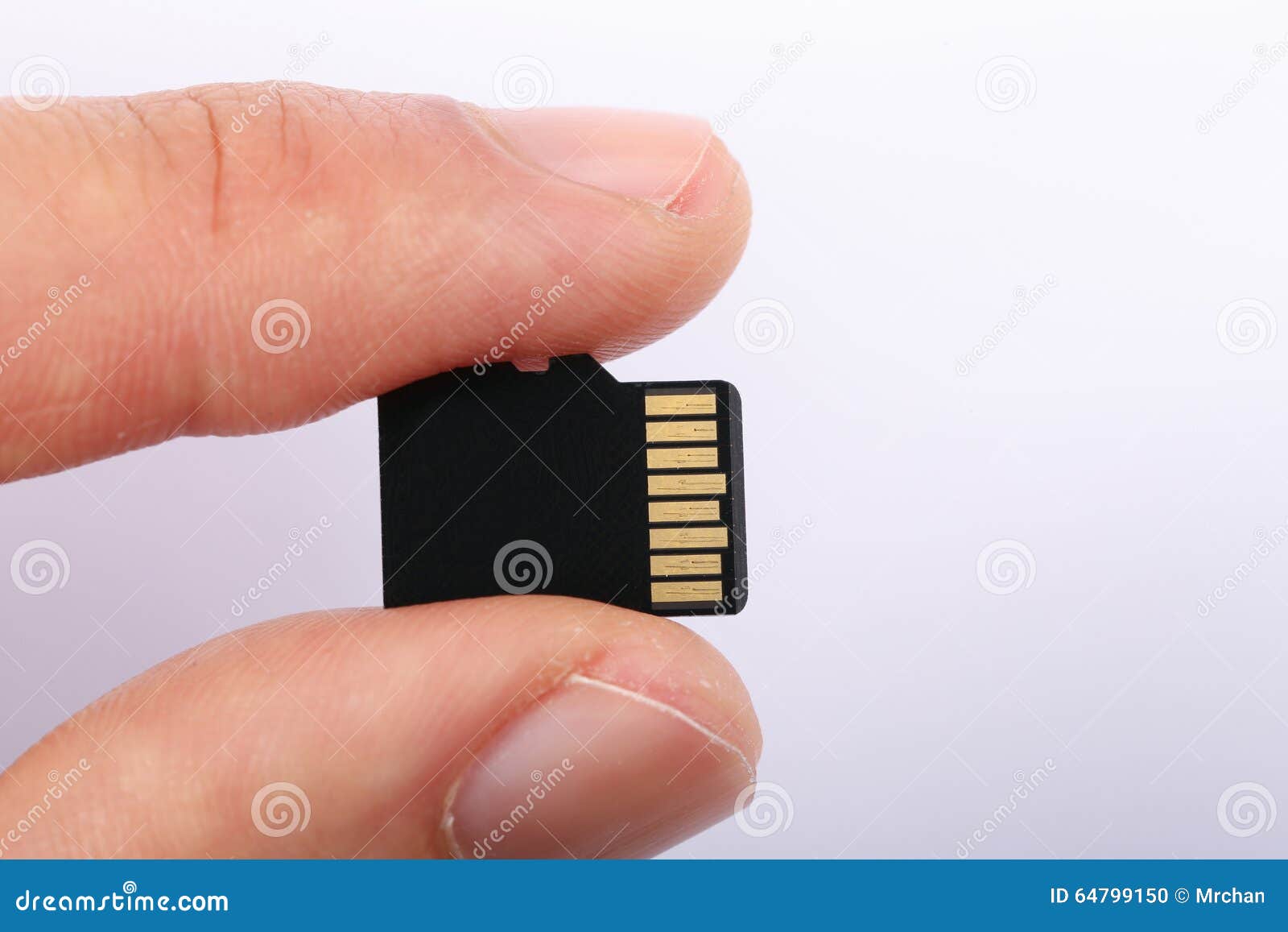 Micro SD Memory Card with Finger Stock Photo - Image of communication ...