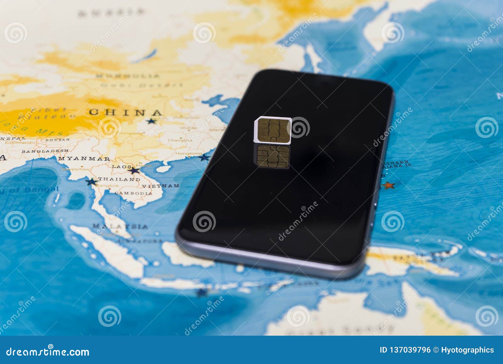 Micro SIM Card and Smartphone on the World Map Stock Photo - Image of ...