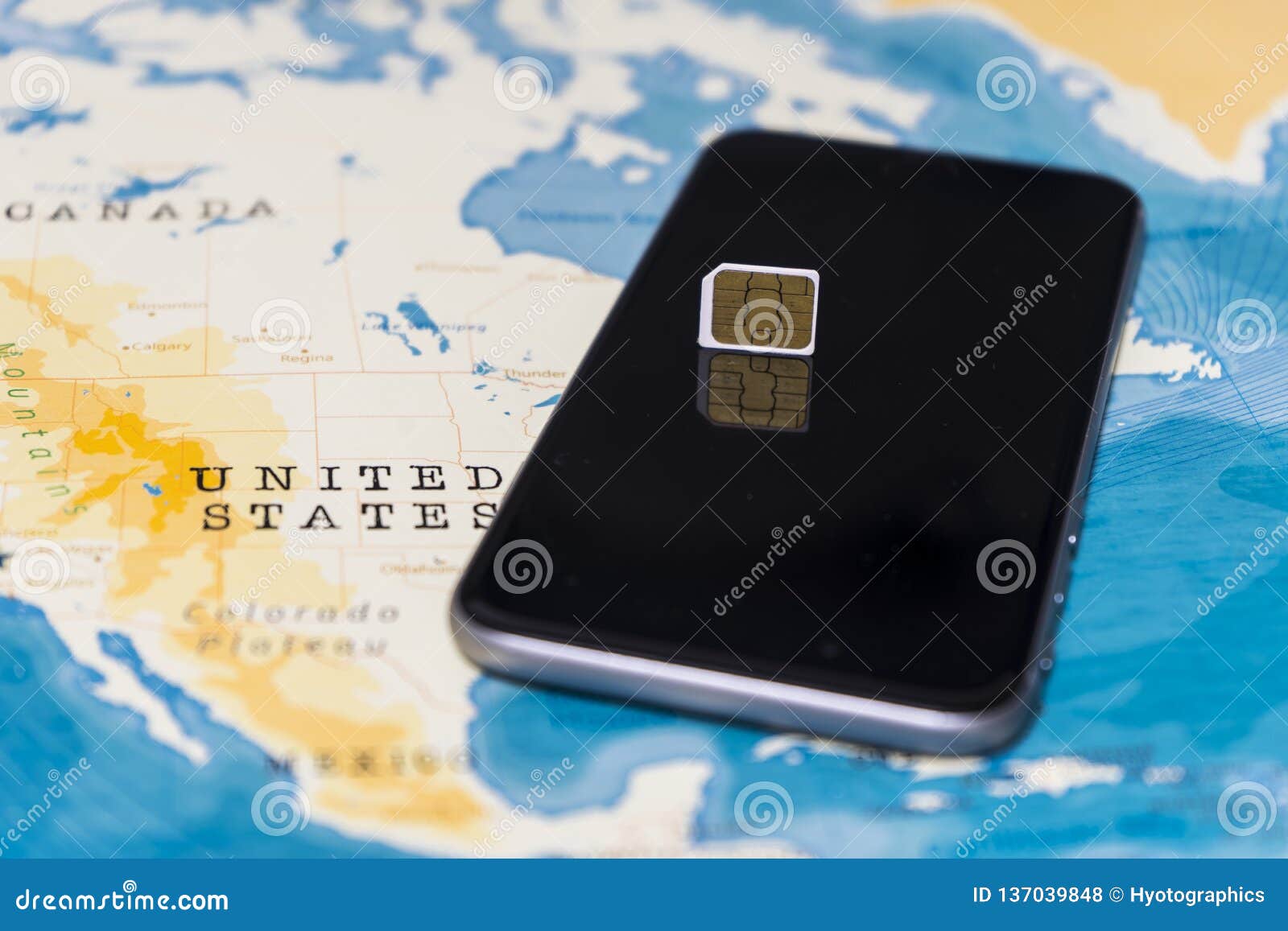Micro SIM Card and Smartphone on the World Map Stock Photo - Image of ...
