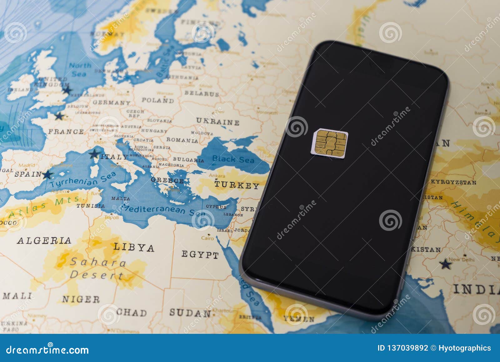 Micro SIM Card and Smartphone on the World Map Stock Photo - Image of ...
