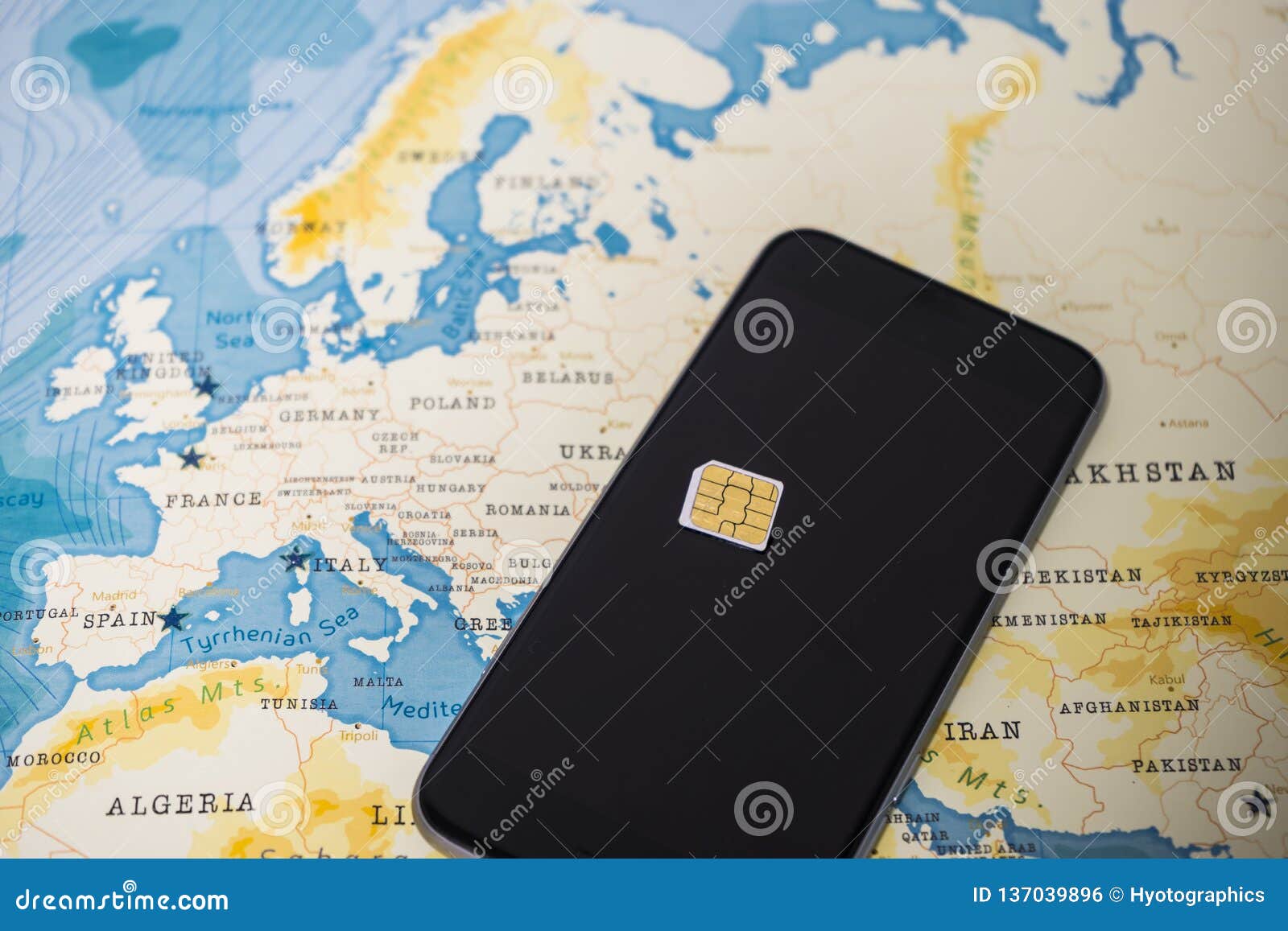 Micro SIM Card and Smartphone on the World Map Stock Photo - Image of ...