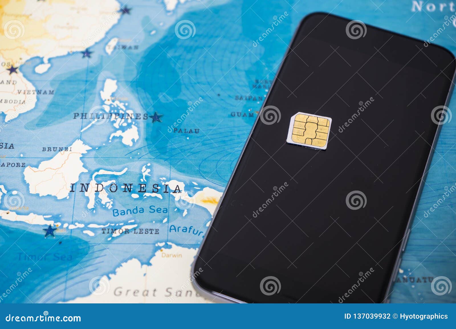 Micro SIM Card and Smartphone on the World Map Stock Photo - Image of ...