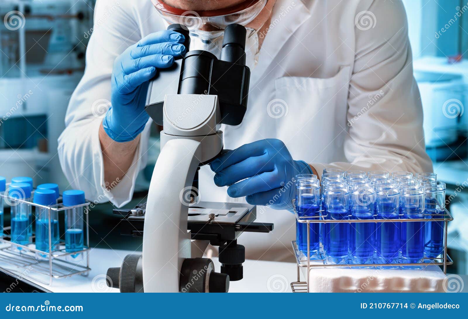 Microscopist Scientist Working with Micro Samples in the Microbiology ...