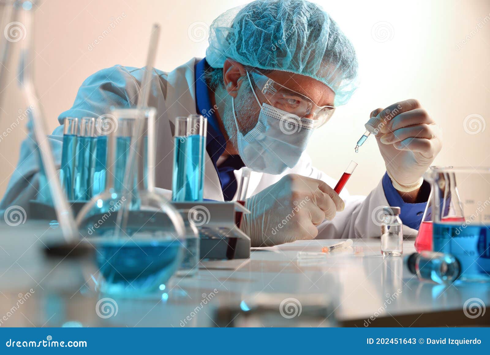 Microbiologist Mixing Reagent with Sample in Laboratory Stock Image ...
