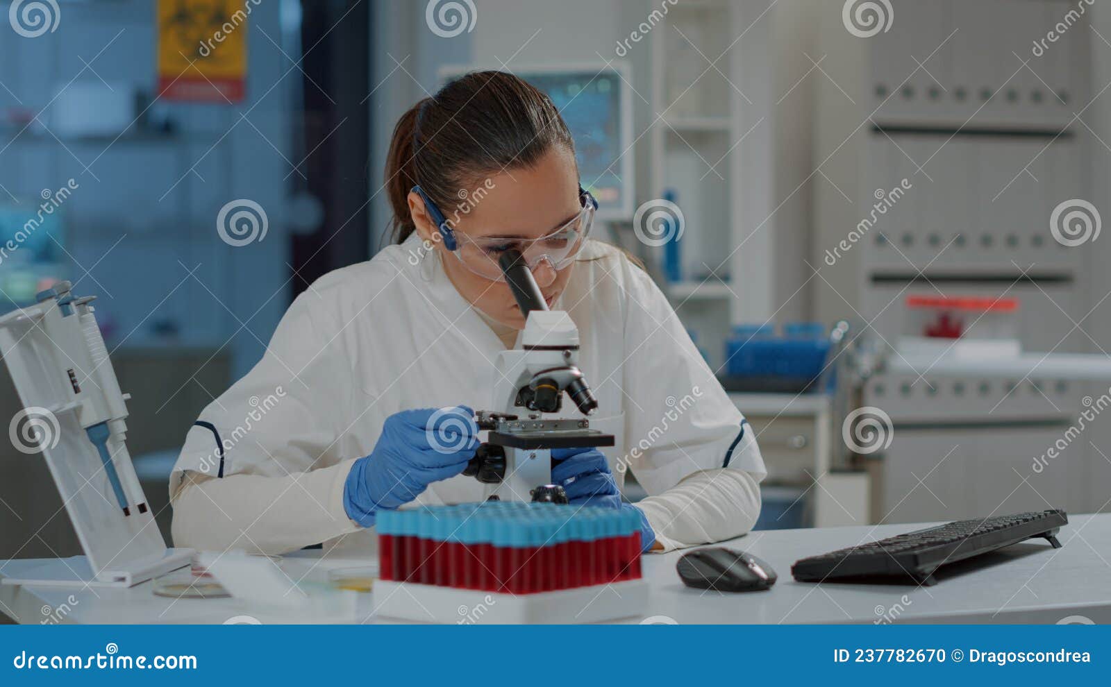 Microbiologist Working with Microscopic Tool To Research Substance ...