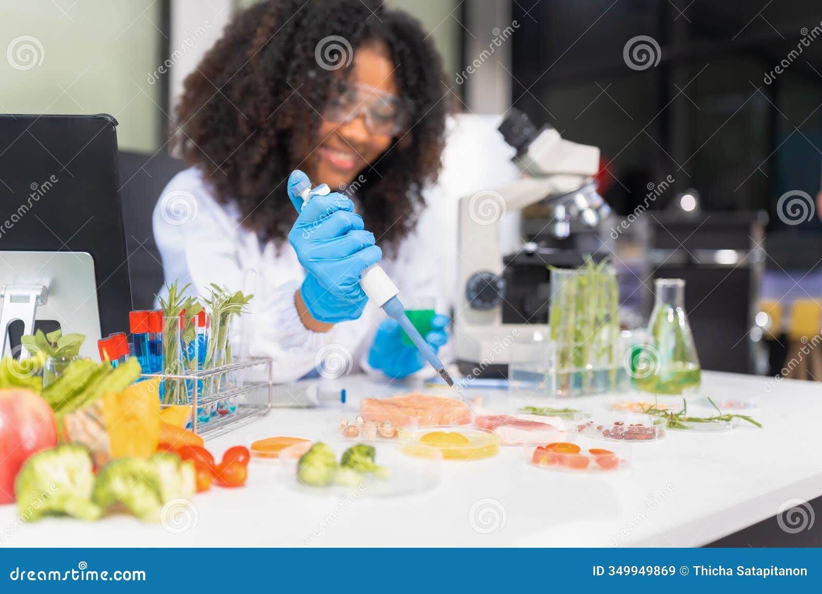Microbiologist Working on Molecule Samples in Modern Food Science Laboratory, Concentration of ...