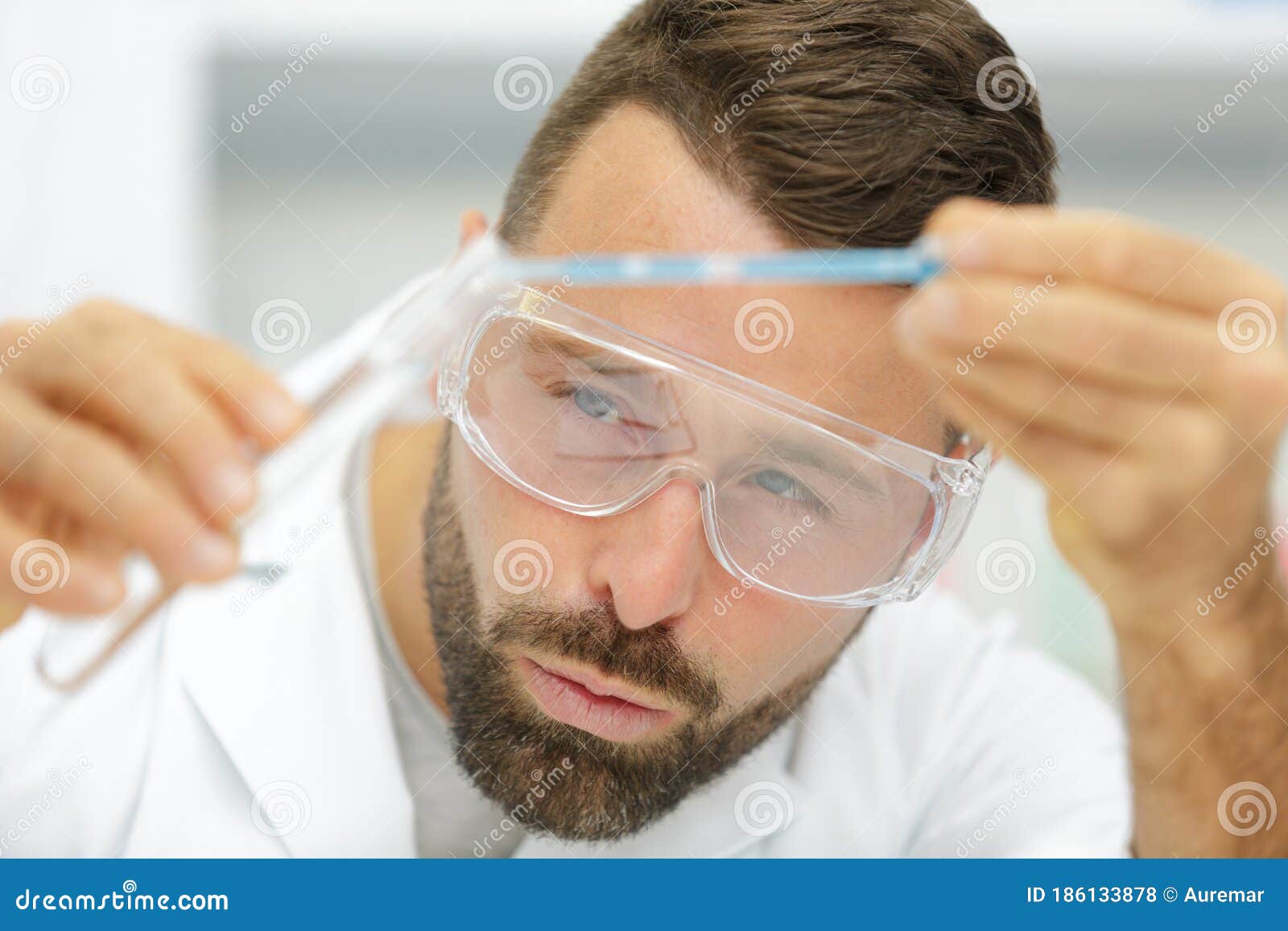 Microbiology Analyst Working with Pipette in Laboratory Stock Photo ...