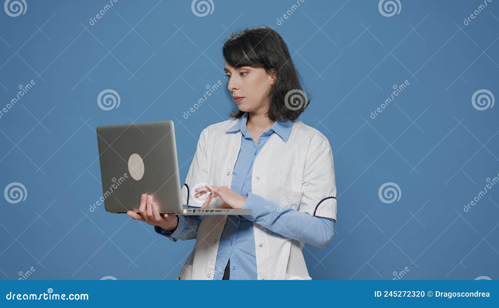 Microbiology Chemist Doing Research Work on Laptop in Studio Stock ...