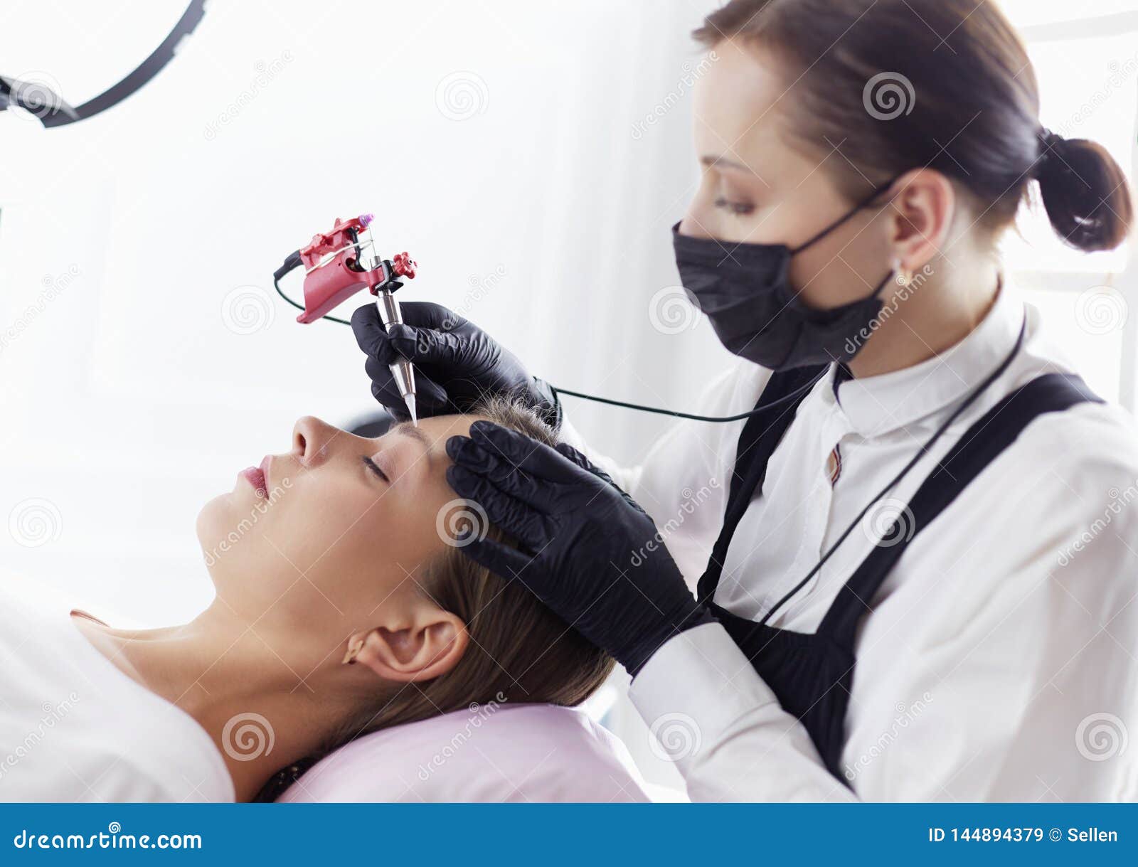 Microblading Eyebrows Work Flow in a Beauty Salon. Woman Having Her Eye ...