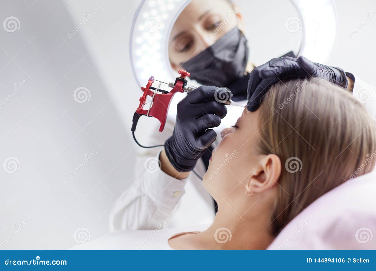 Microblading Eyebrows Work Flow in a Beauty Salon. Woman Having Her Eye ...