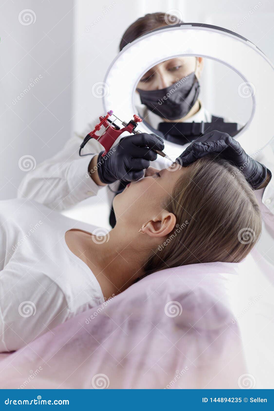 Microblading Eyebrows Work Flow in a Beauty Salon. Woman Having Her Eye ...