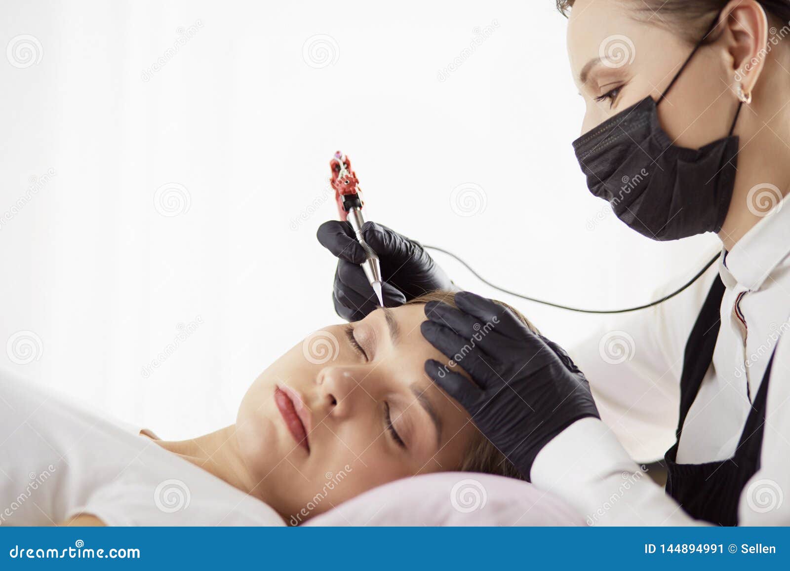 Microblading Eyebrows Work Flow in a Beauty Salon. Woman Having Her Eye ...