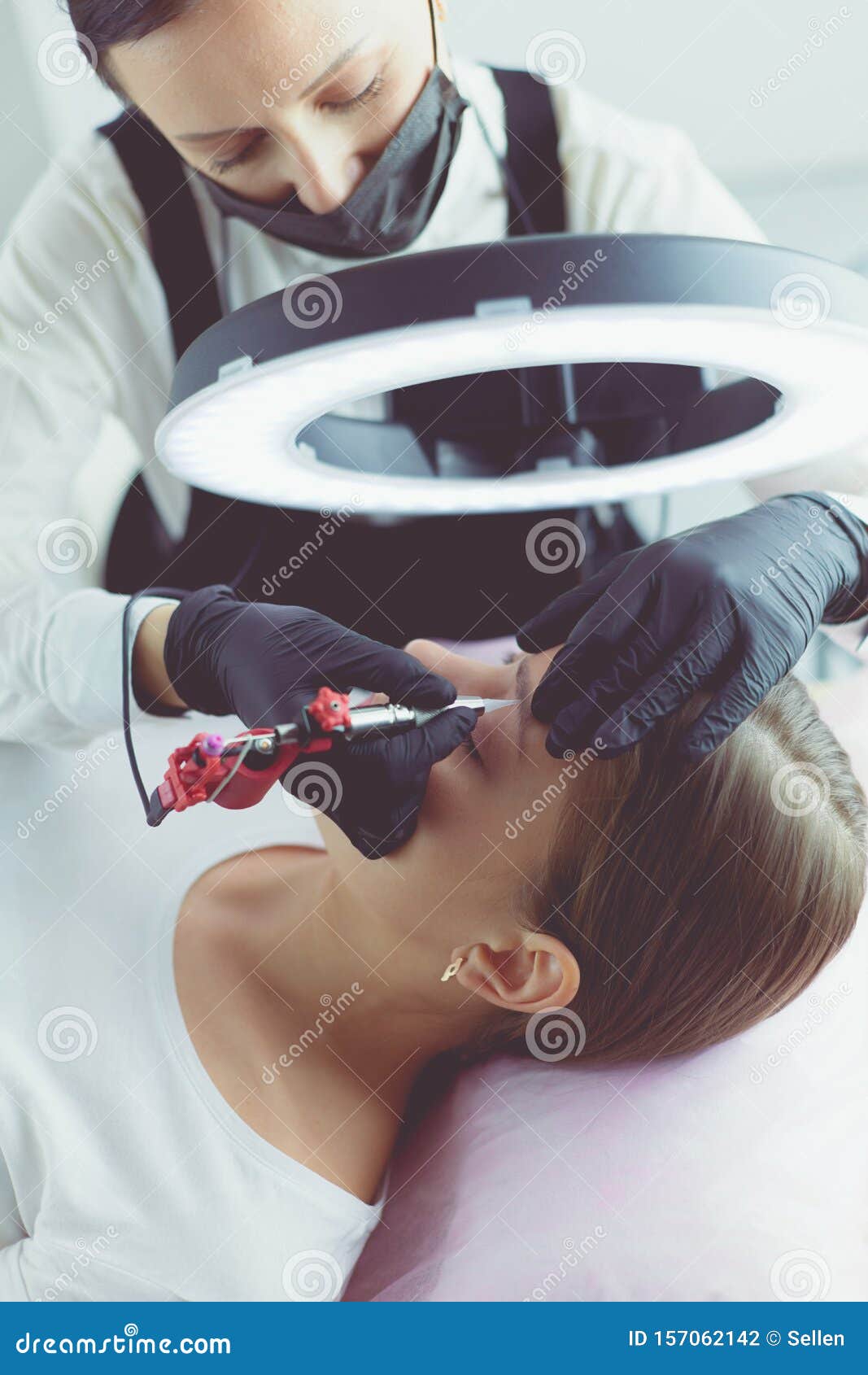 Microblading Eyebrows Work Flow in a Beauty Salon. Woman Having Her Eye ...