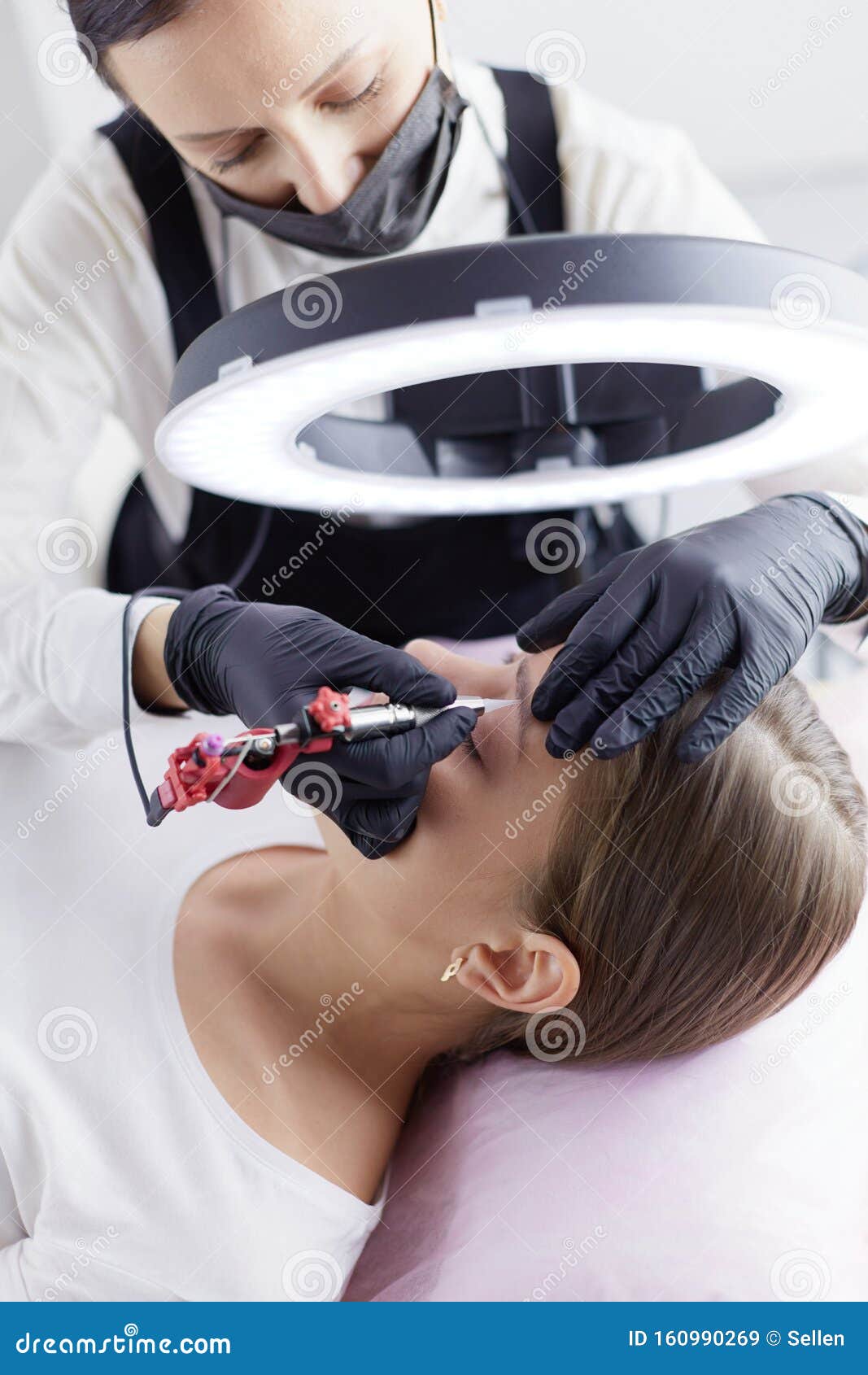 Microblading Eyebrows Work Flow in a Beauty Salon. Woman Having Her Eye ...