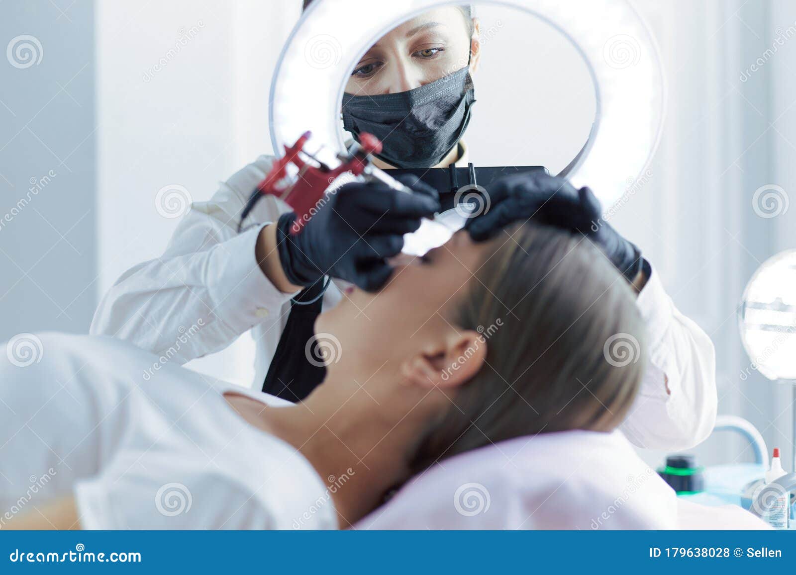 Microblading Eyebrows Work Flow in a Beauty Salon. Woman Having Her Eye ...