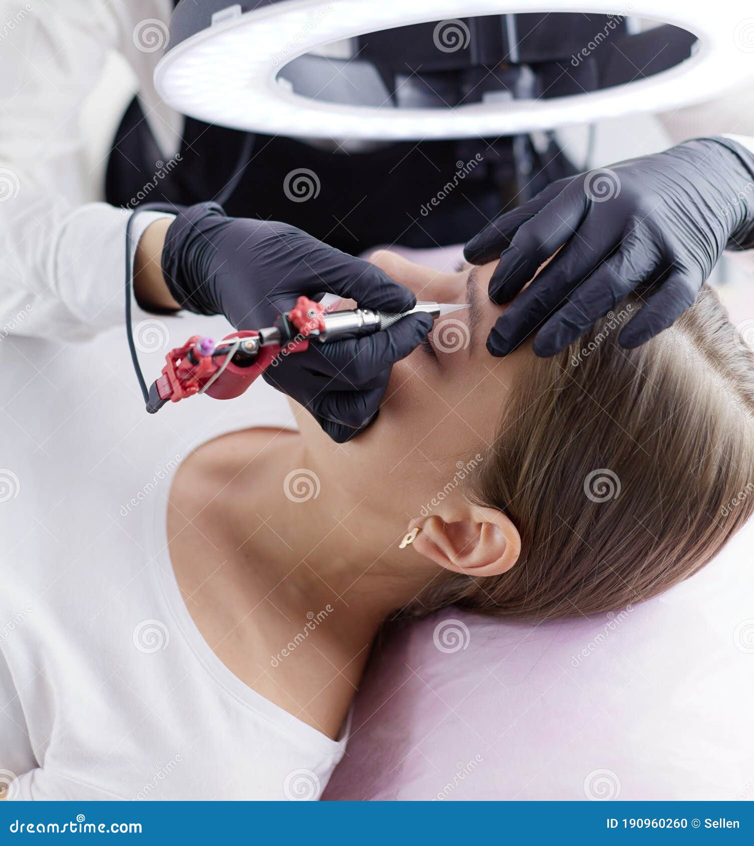 Microblading Eyebrows Work Flow in a Beauty Salon. Woman Having Her Eye ...