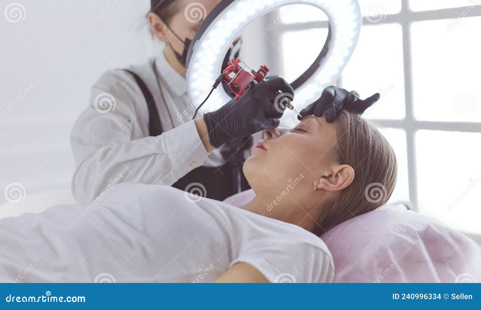 Microblading Eyebrows Work Flow in a Beauty Salon. Woman Having Her Eye ...