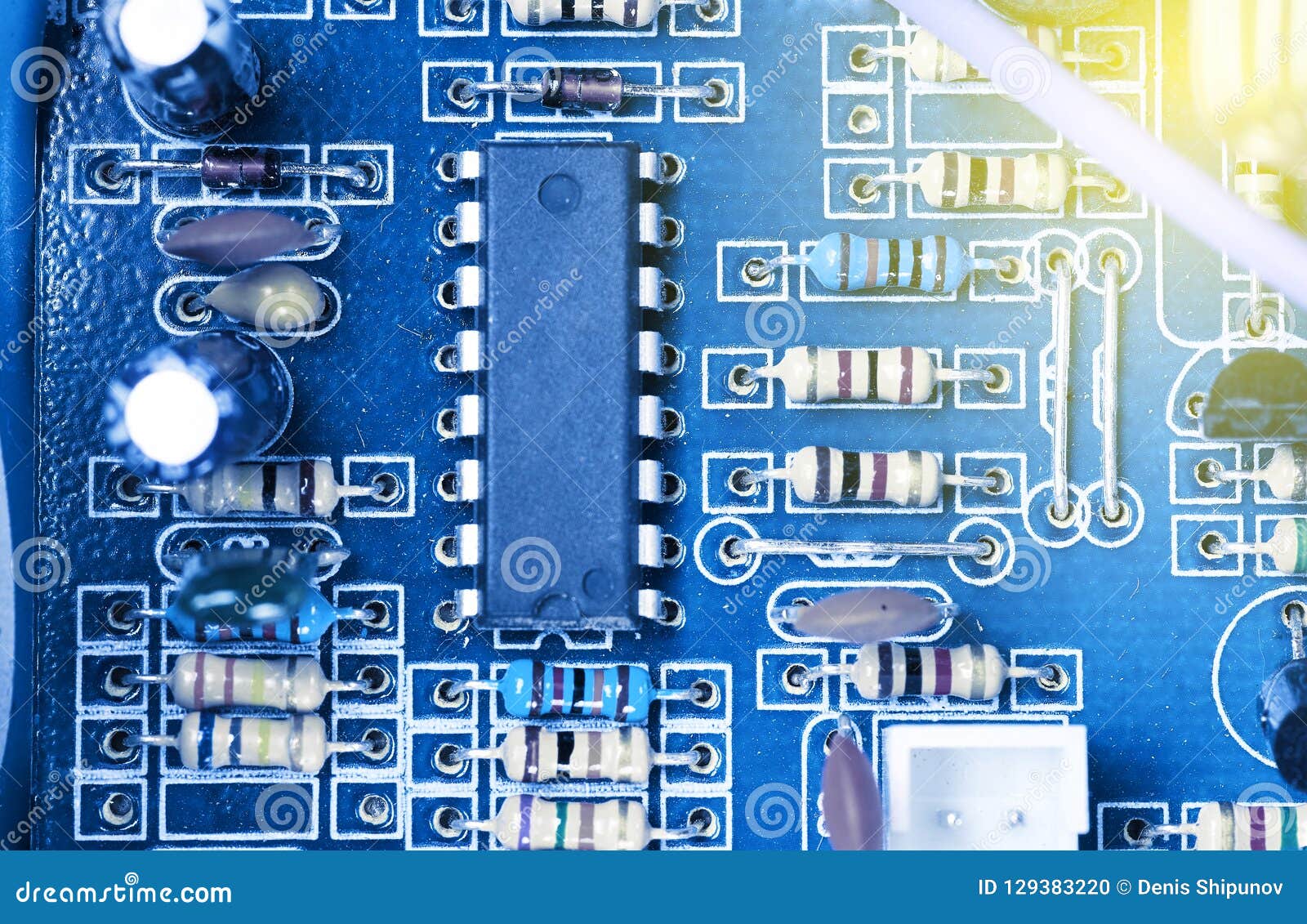 Microchip, Capacitors, Resistors on a Blue Computer Board. Industrial ...