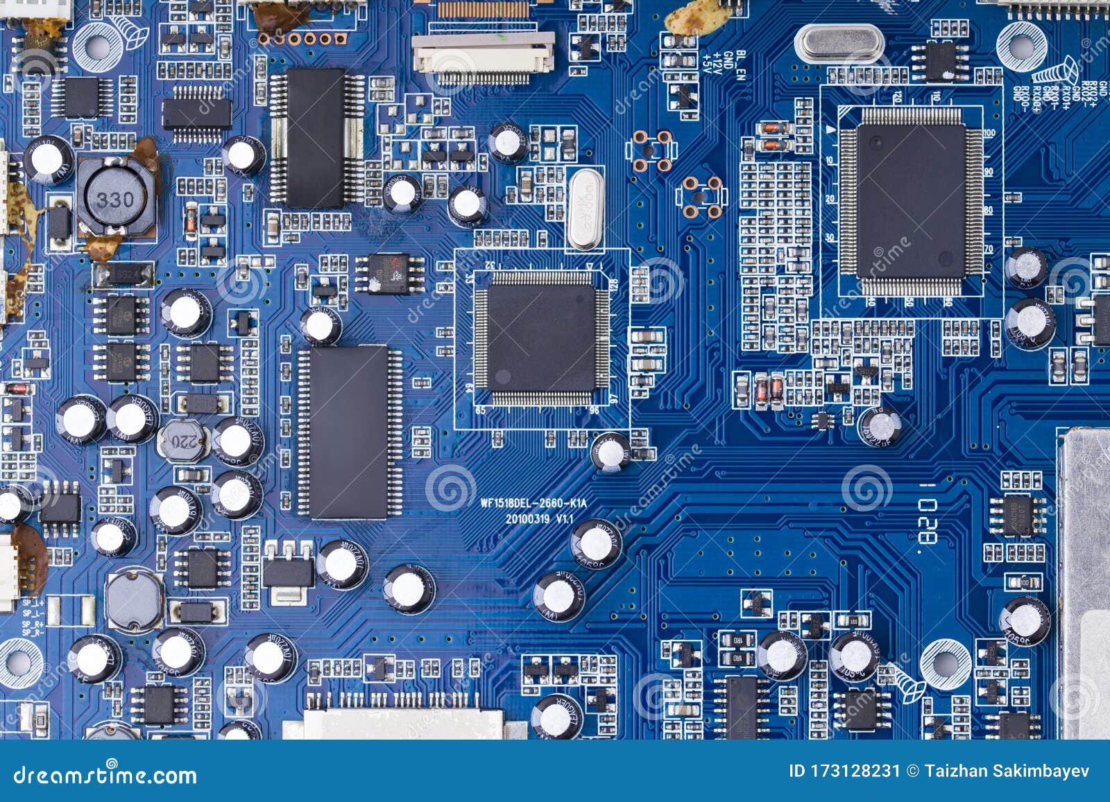 Microchip, Capacitors, Resistors on a Blue Computer Board. Close Up ...