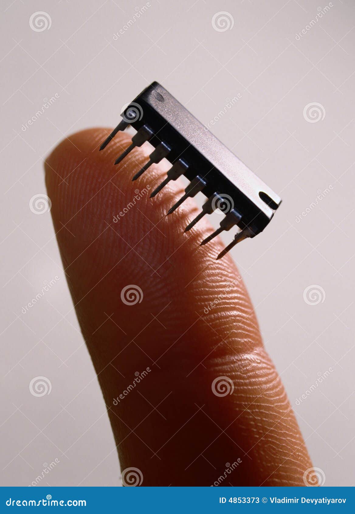 Microchip on finger stock image. Image of computers, finger - 4853373