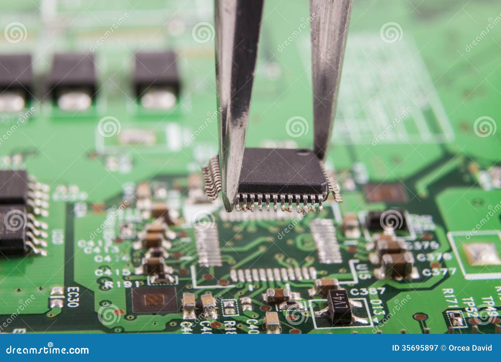 Microchip Removal stock image. Image of equipment, motherboard - 35695897