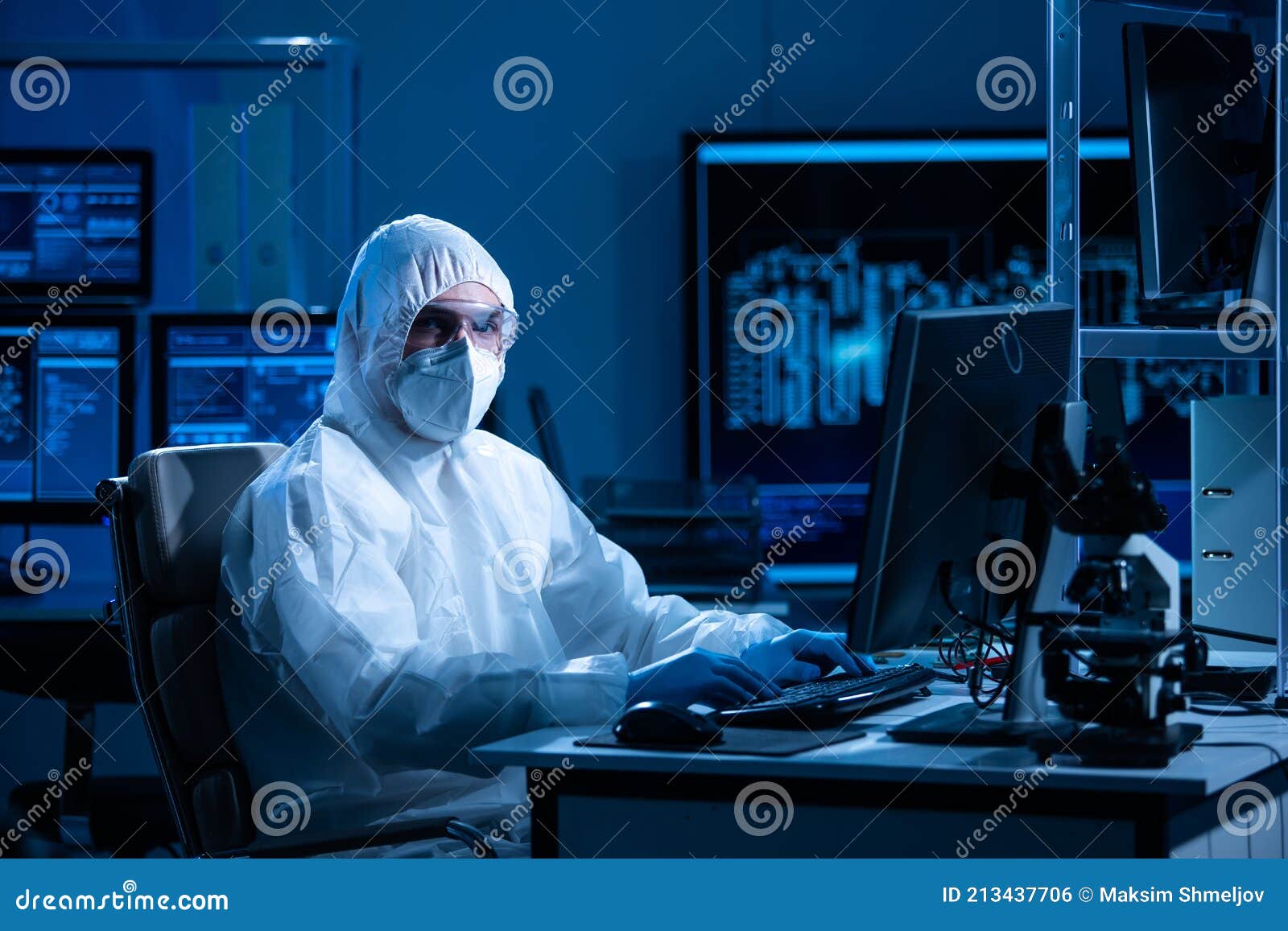 Microelectronics Engineer Works in a Modern Scientific Laboratory on ...