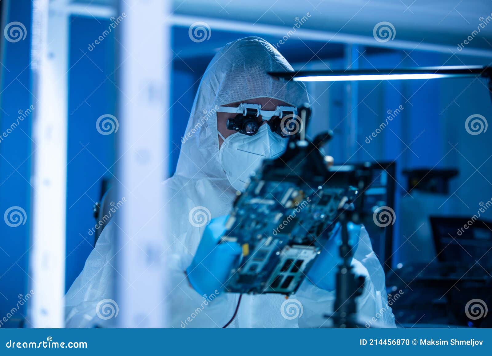 Microelectronics Engineer Works in a Modern Scientific Laboratory on ...