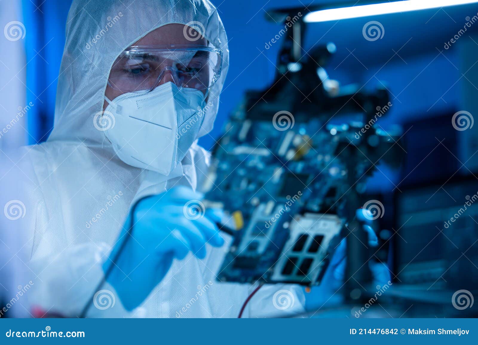 Microelectronics Engineer Works in a Modern Scientific Laboratory on ...