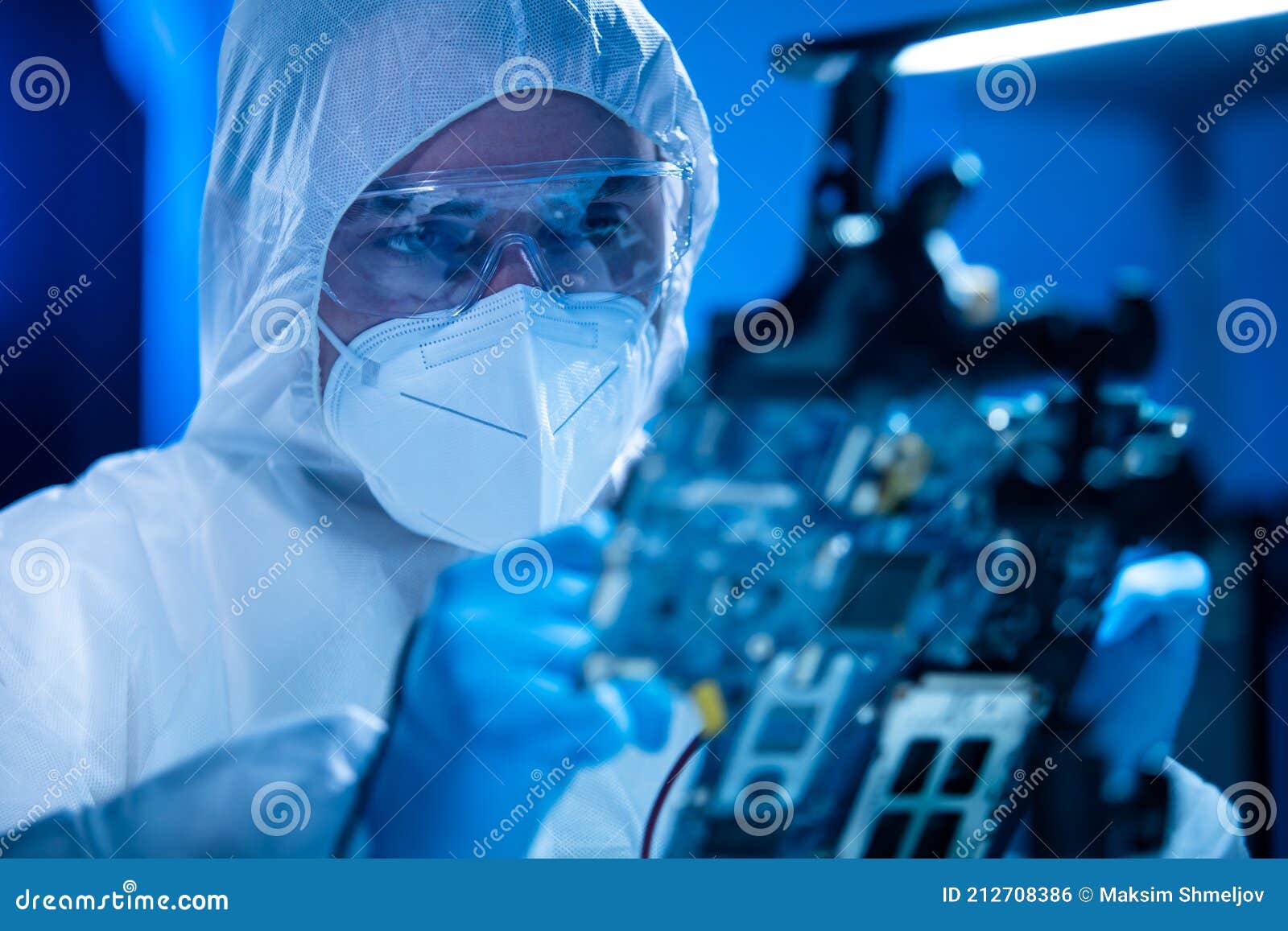 Microelectronics Engineer Works in a Modern Scientific Laboratory on ...