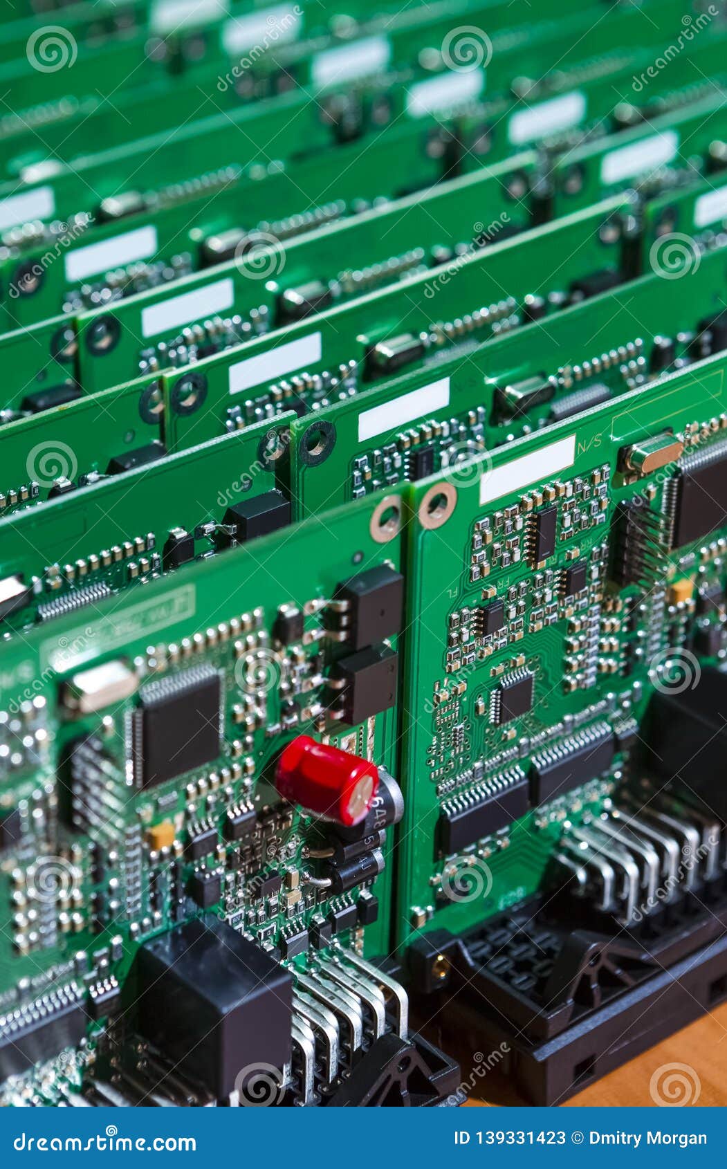 Microelectronics Industry and Manufacturing. Stack of Produced Printed ... Microelectronics Industry and Manufacturing. Stack of Produced Printed ...