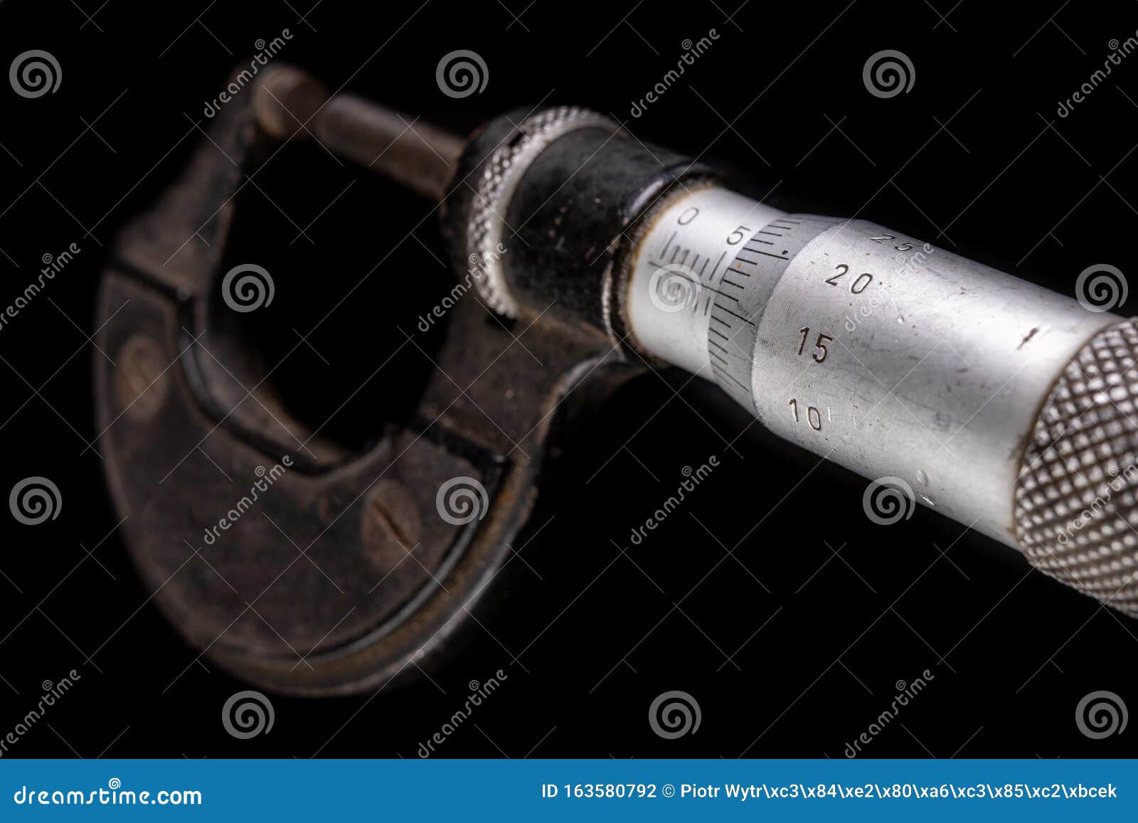 Micrometer on a Dark Workshop Table. a Tool for Precise Measurement in ...