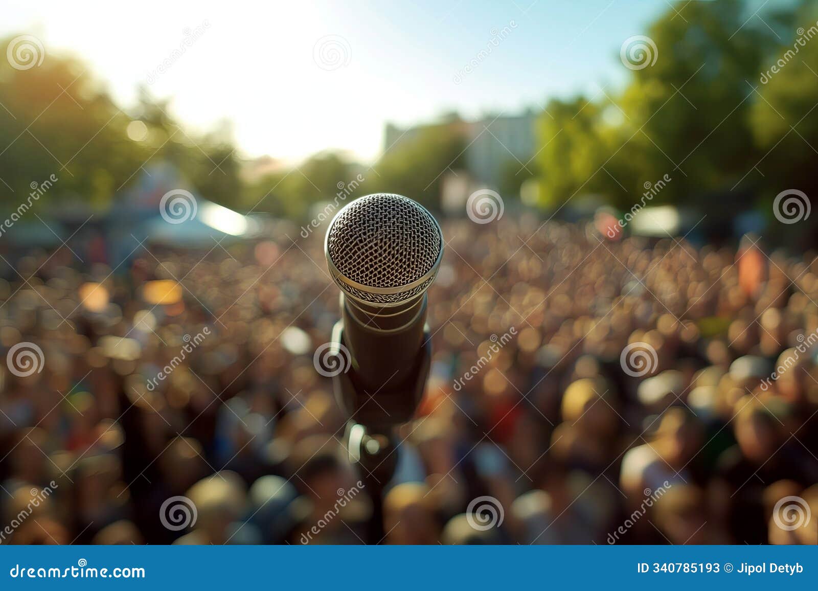 Microphone and Blurred Background of a Large Crowd during an Outdoor ...