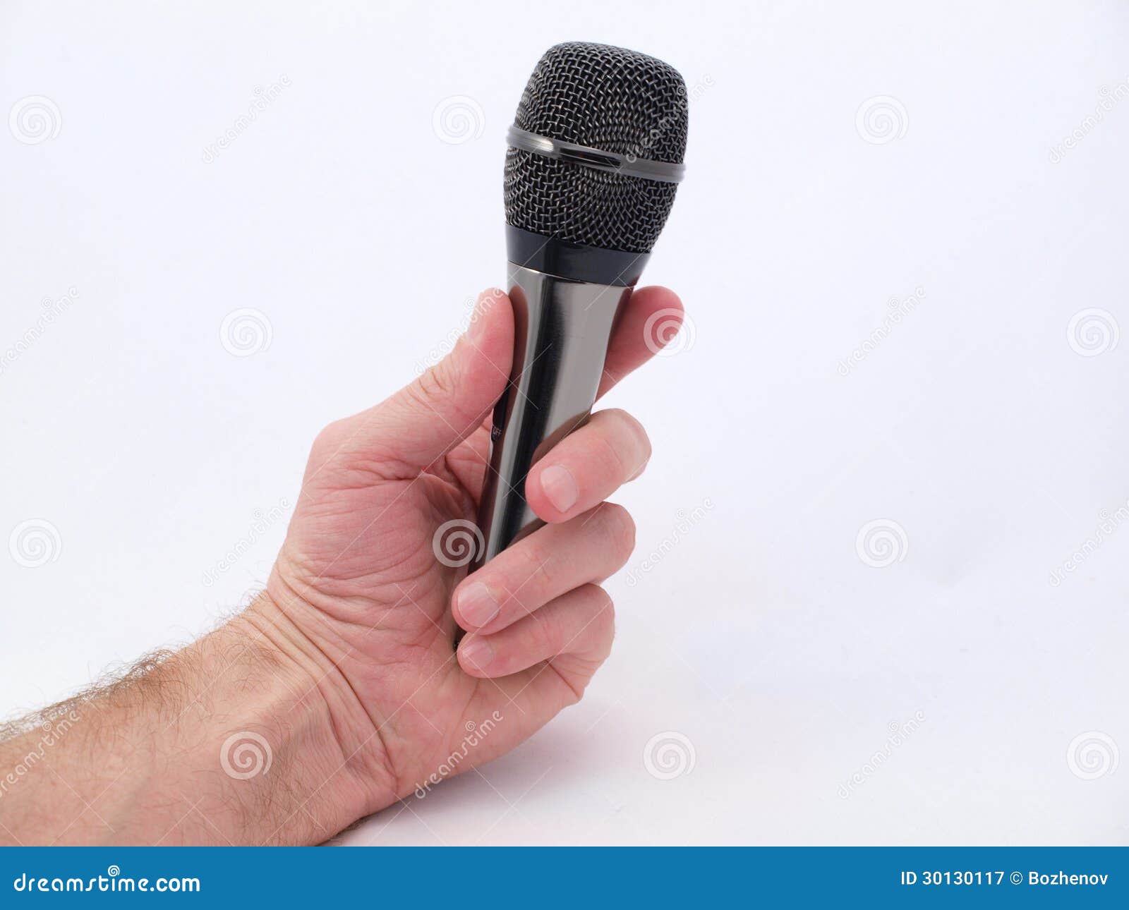 Microphone dans une main image stock. Image du journaliste - 30130117